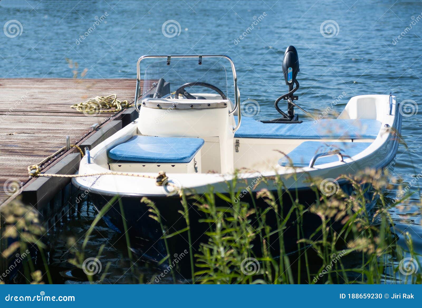 Small White Blue Boat with Electric Engine at Marina Stock Photo ...