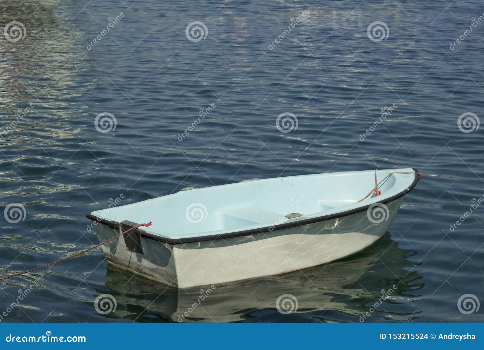 A Small White Boat on the Water Stock Photo - Image of white, lake ...