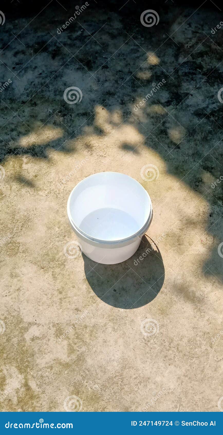 A Small White Bucket that is Being Heated Stock Photo - Image of circle ...