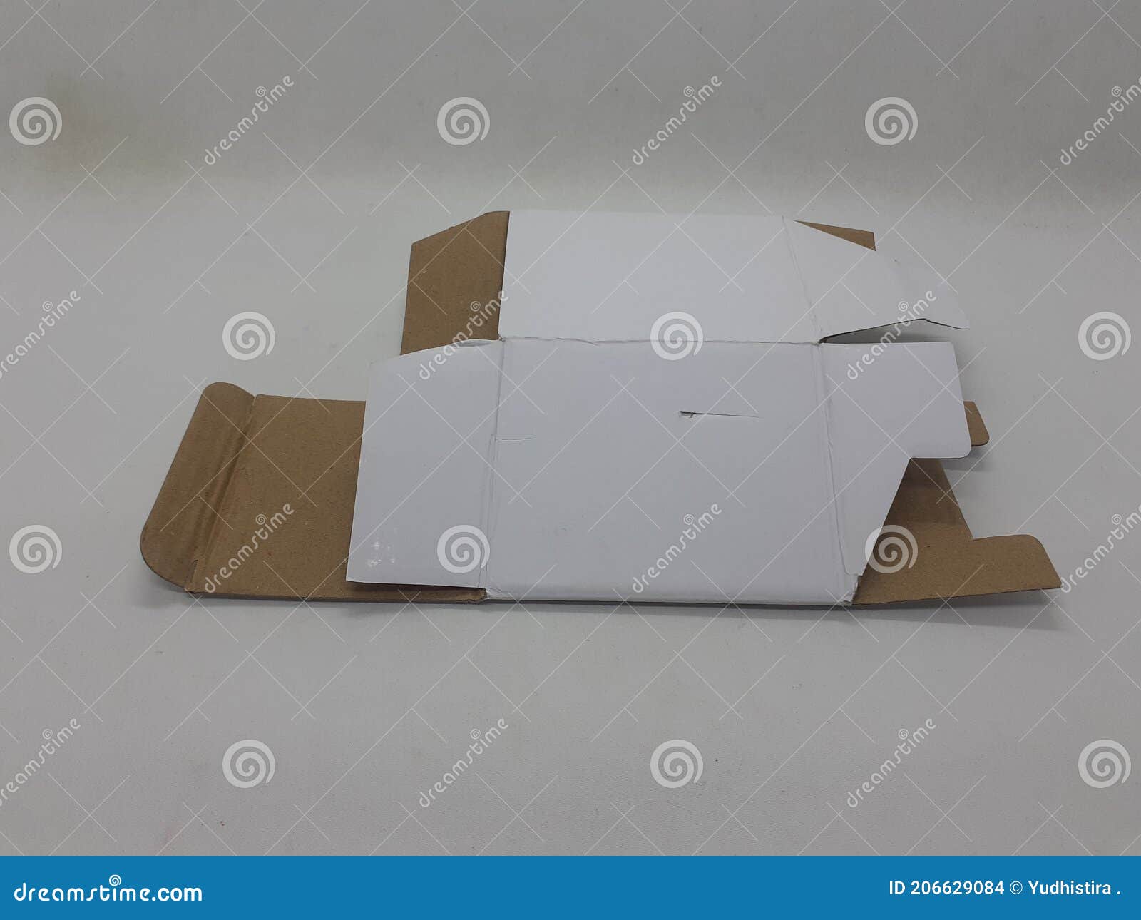 A Small White Foldable Paper Boxes in White Isolation Background Stock ...