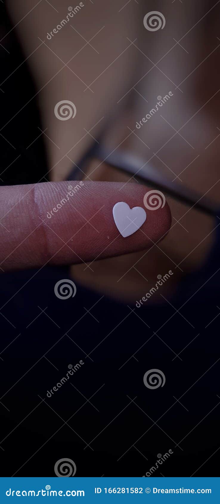 Small white heart stock photo. Image of finger, small - 166281582