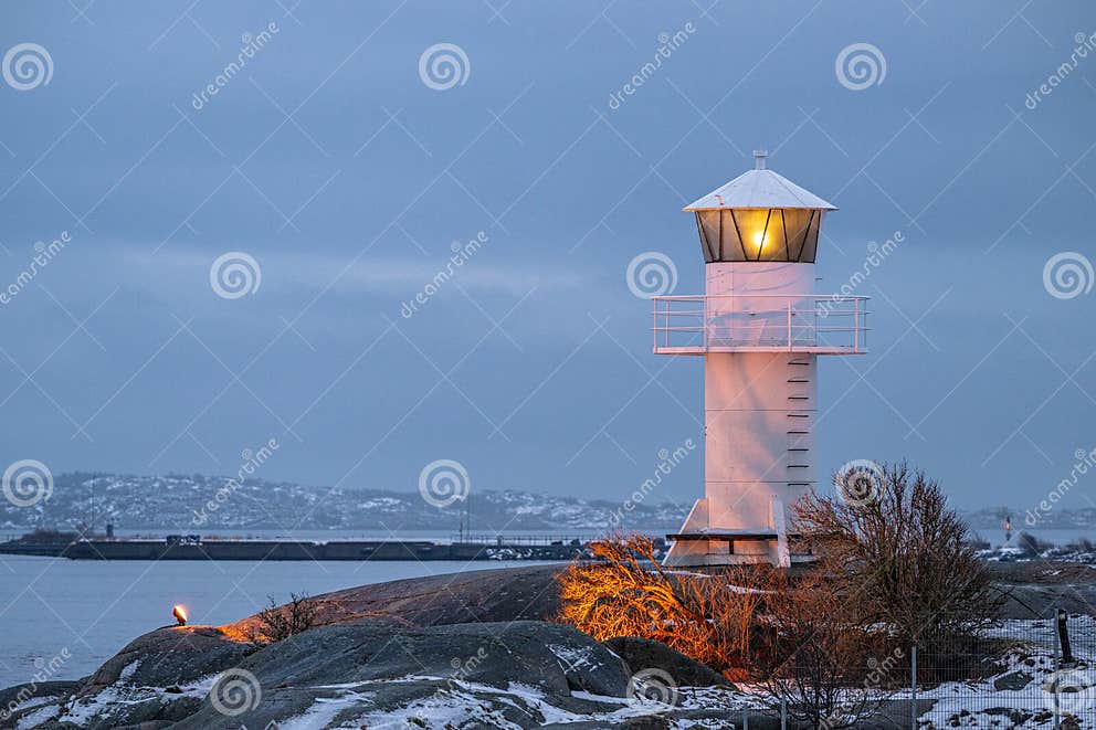 Small White Lighthouse by the Harbour.. Stock Image - Image of landmark ...