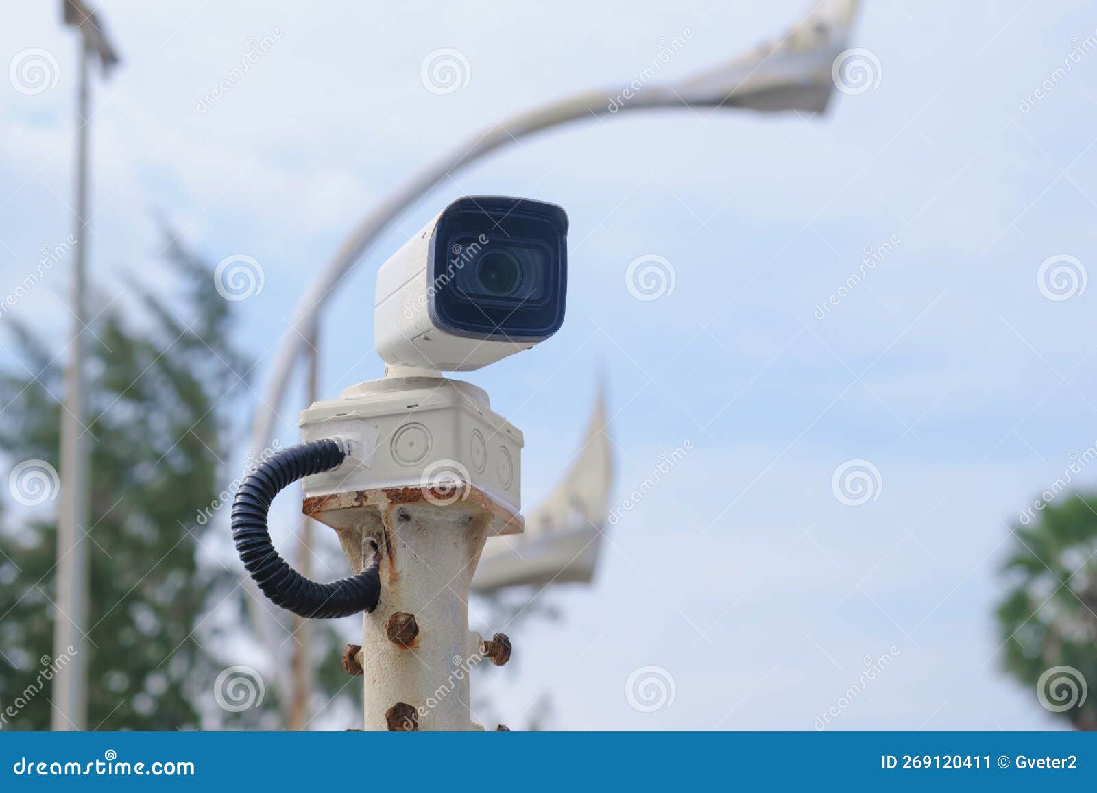 Small White Road CCTV Camera Camera on a Rusty Pole Along the Road ...