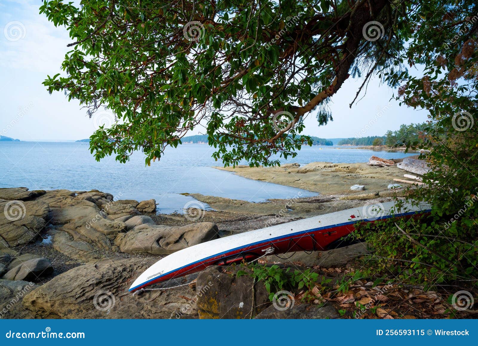 Small White Rowing Boat Turned Upside Down on the Shores of a Beach ...