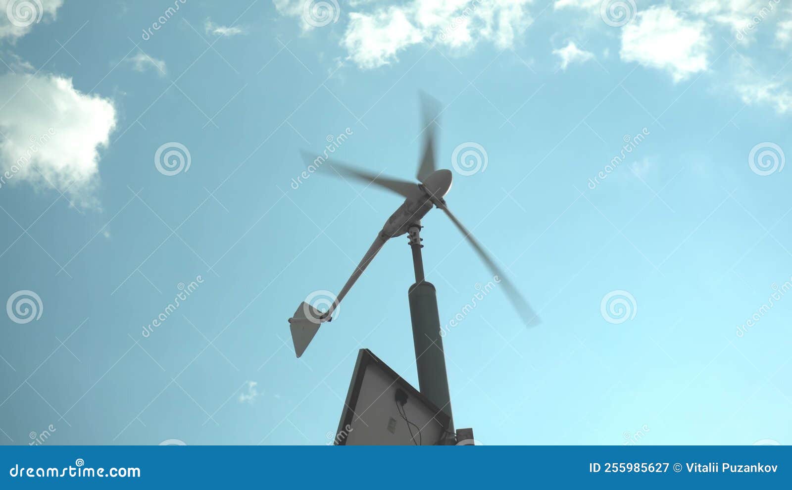 A Small Wind Generator on a Pole Against the Sky. Production of ...