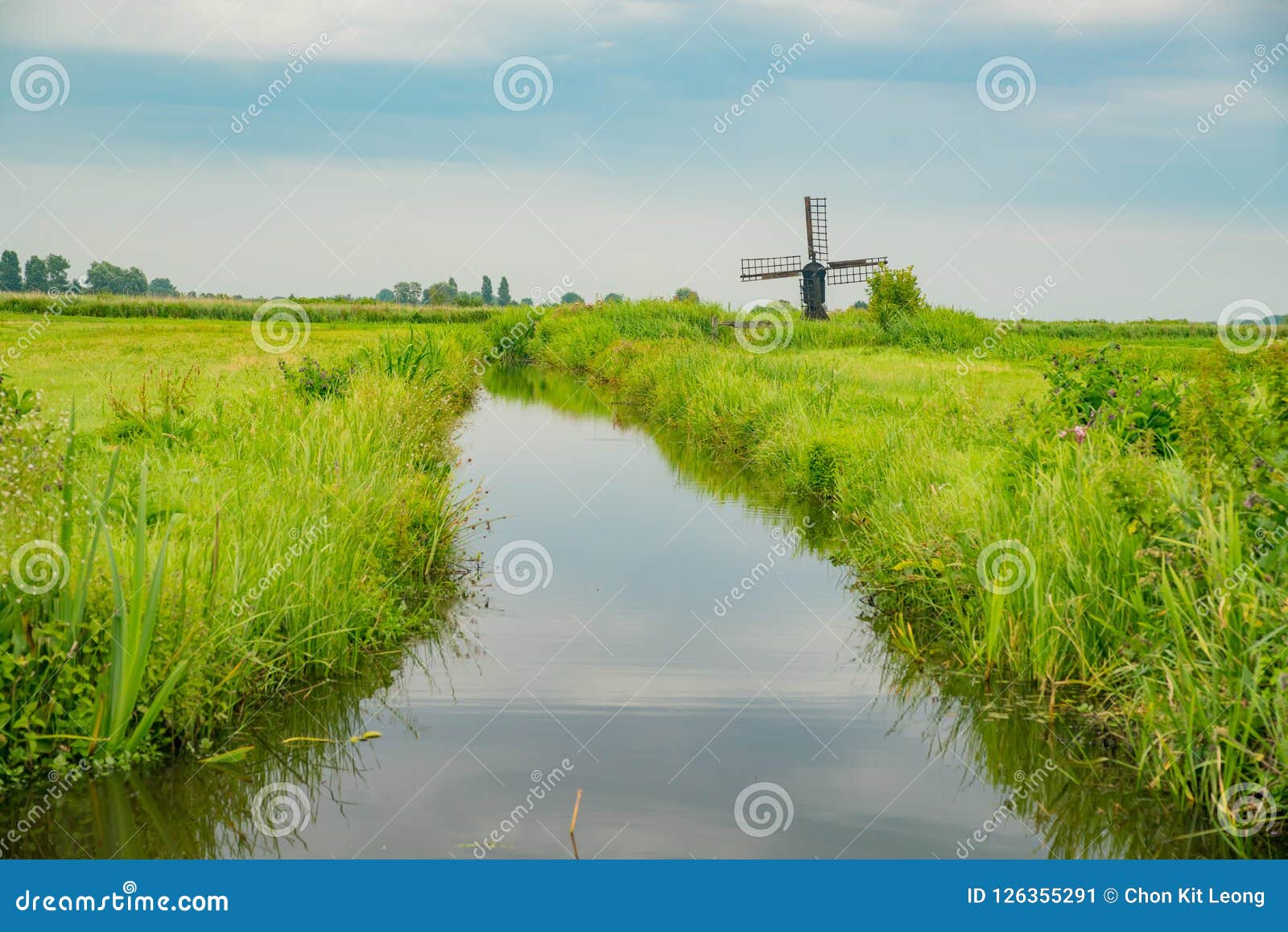Small Windmill and Grass Field Stock Image - Image of holland, windmill ...