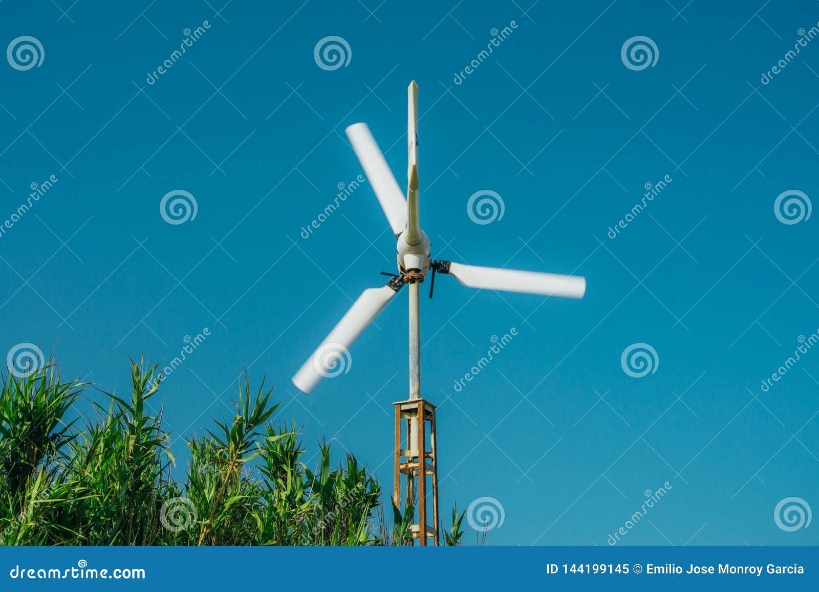 Small windmill in movement stock image. Image of industry - 144199145