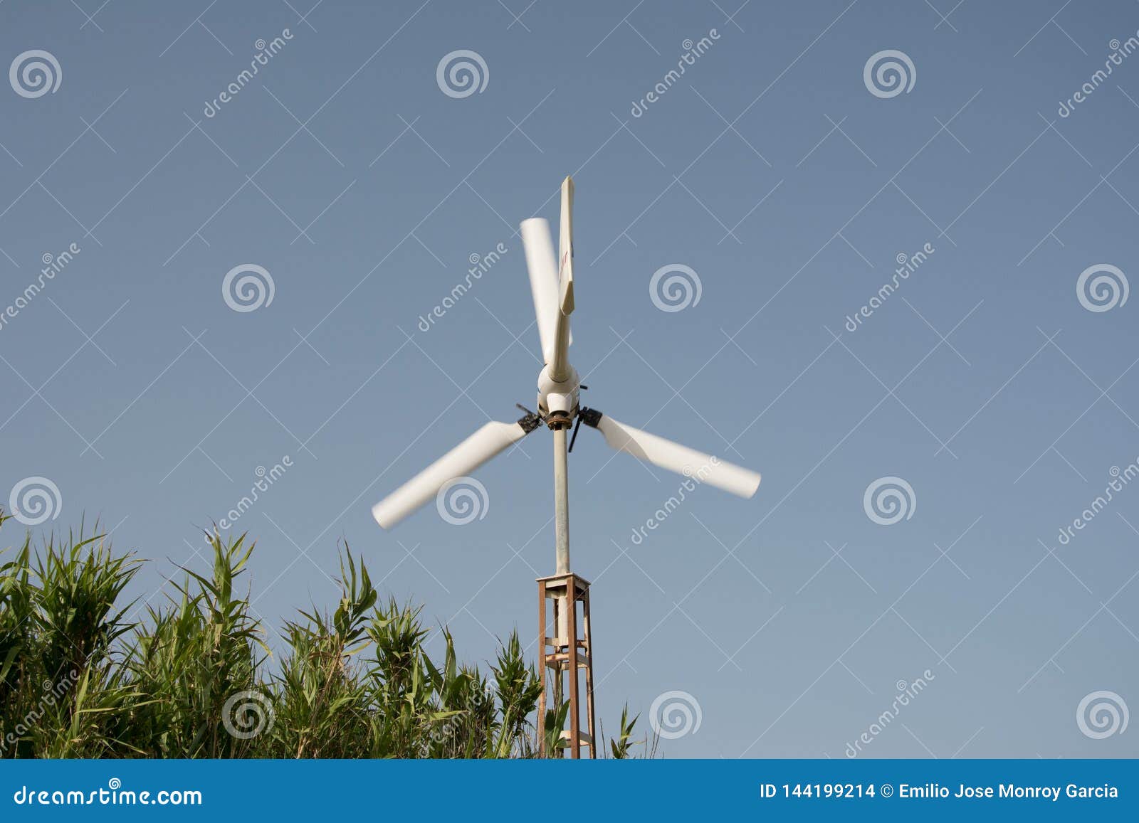 Small windmill in movement stock photo. Image of power - 144199214