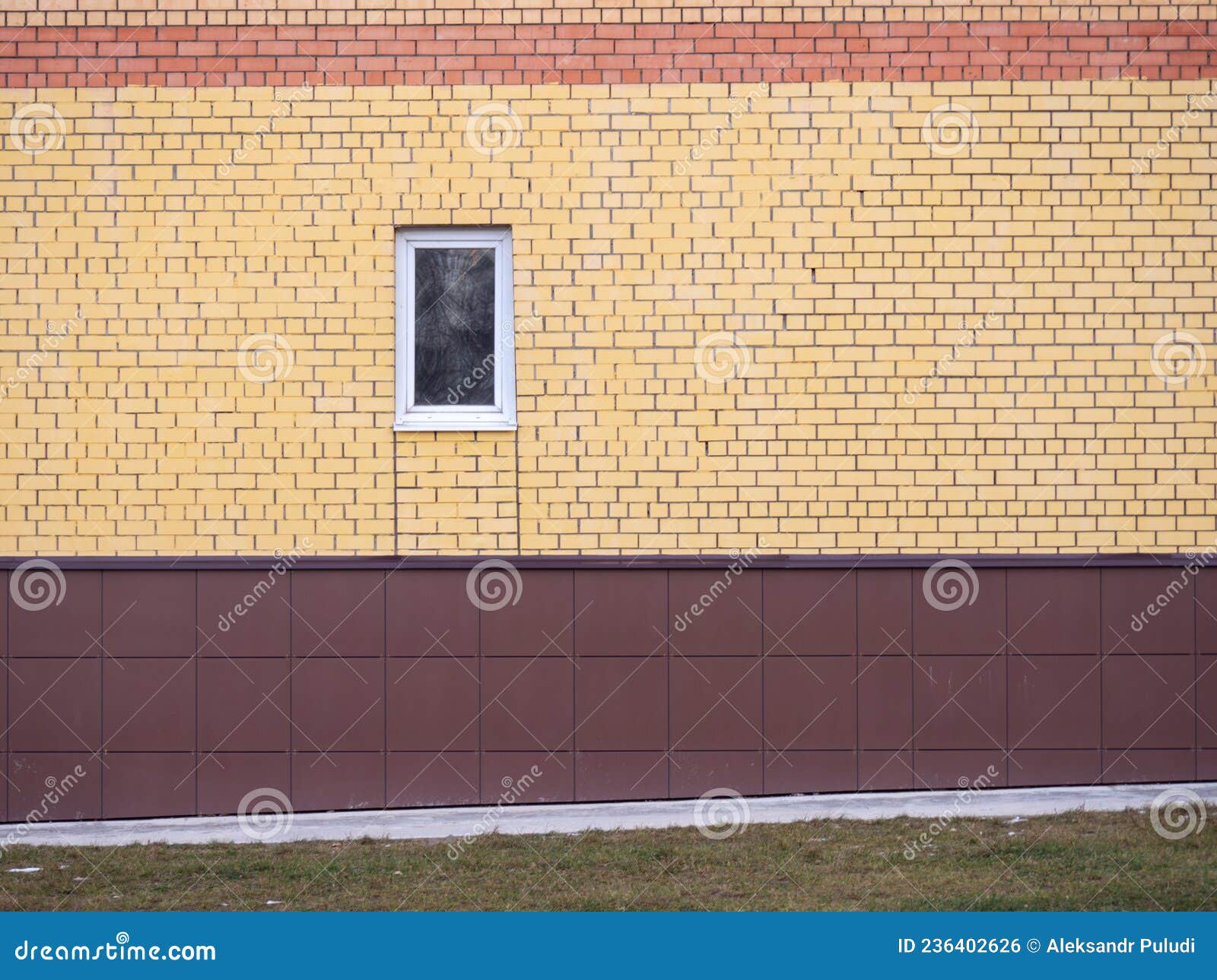 A Small Window in a Brick Wall. Colored Bricks Stock Photo - Image of ...