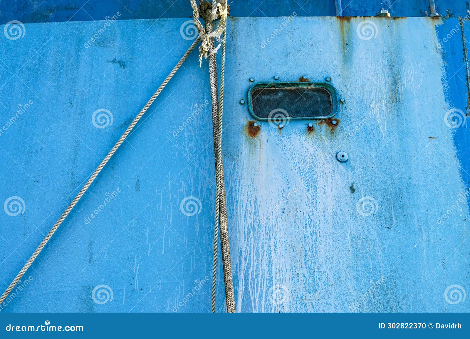 A Small Window in the Hull of a Blue Fishing Boat Stock Photo - Image ...