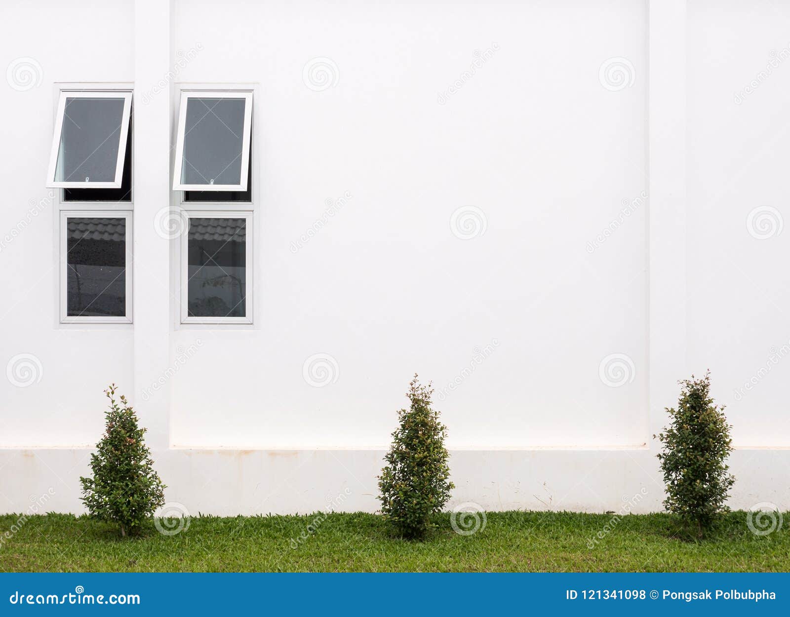Side Wall Of A Stone Church With Stained-glass Windows Royalty-Free ...