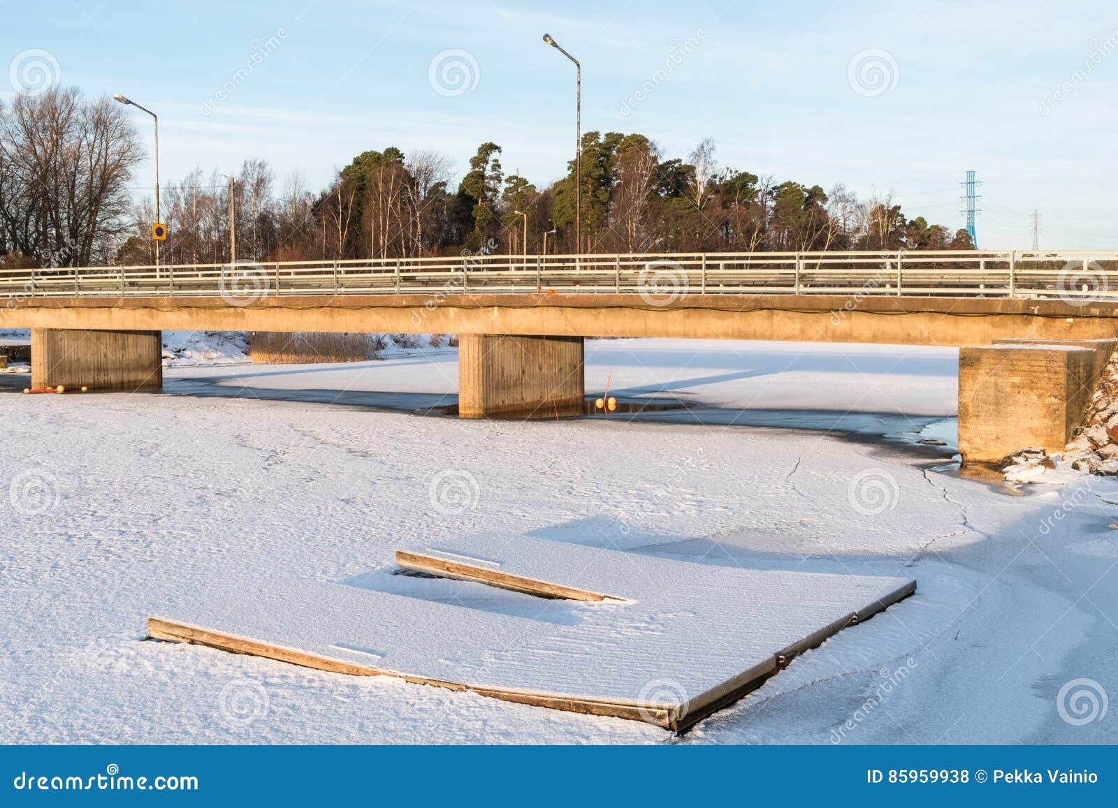 Small Wooden Dock and a Bridge Stock Photo - Image of wooden, snow ...