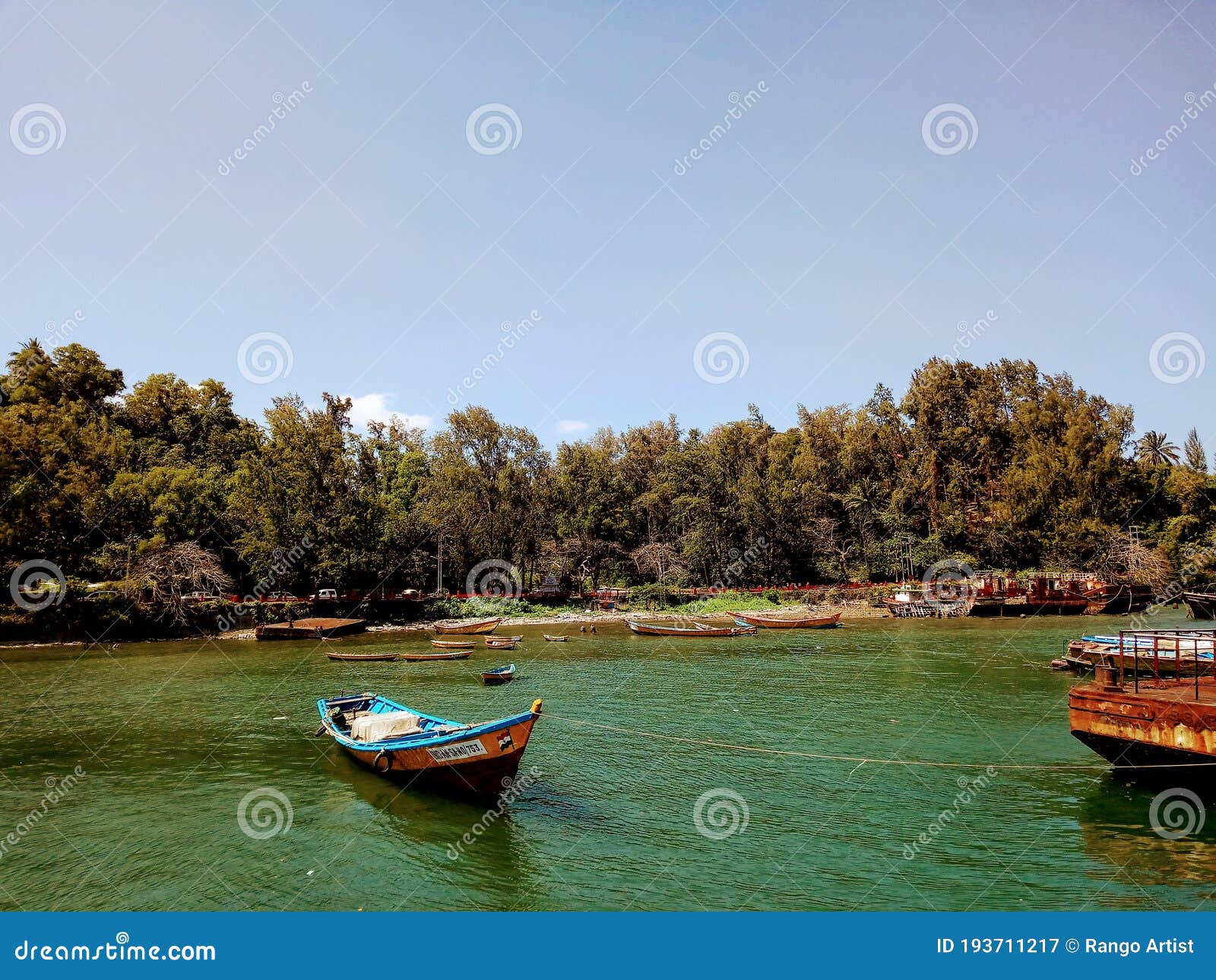 Small wooden ship on lake editorial photography. Image of tree - 193711217