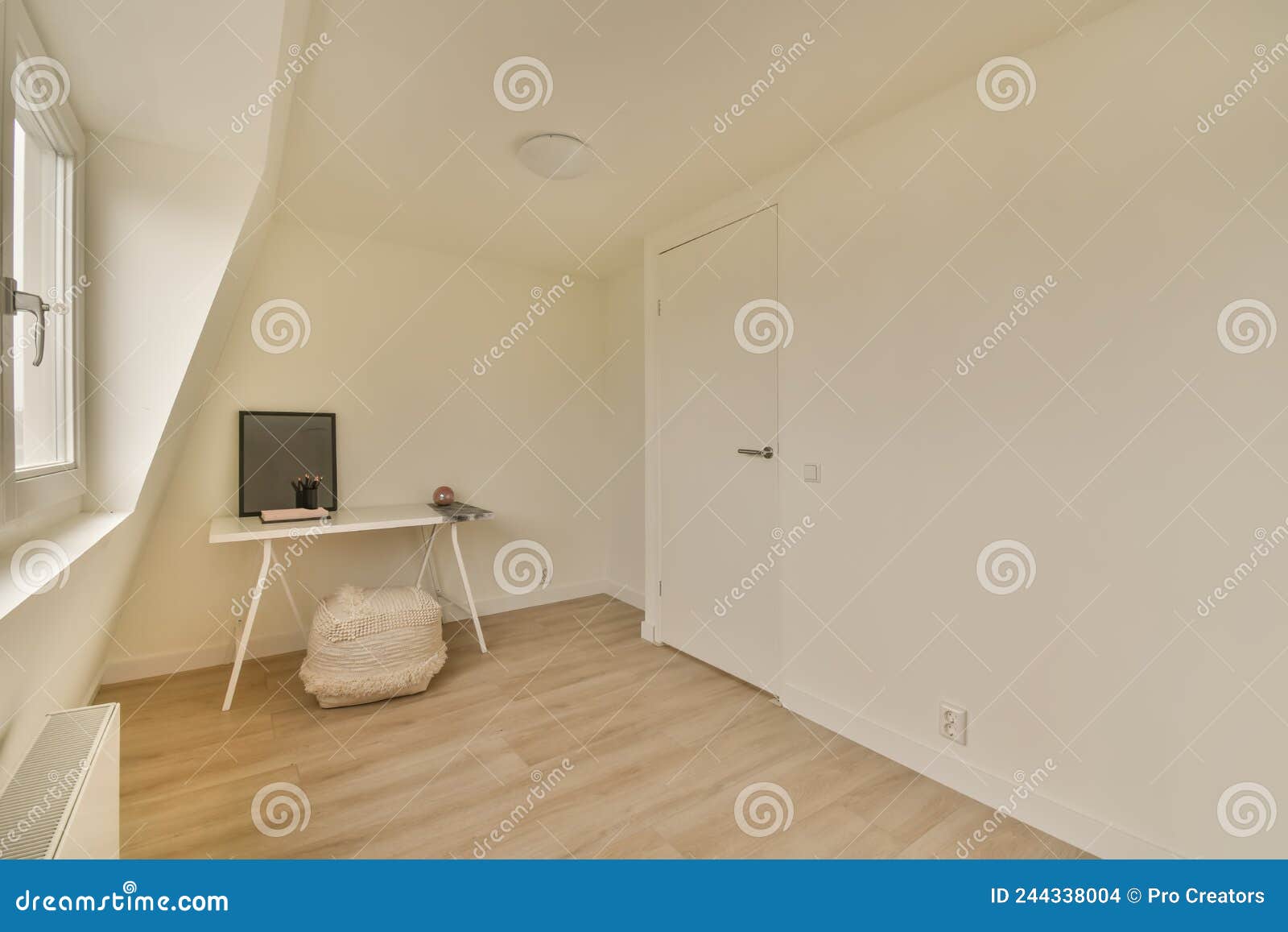 A Small Work Area with a Soft Seat on Stock Photo - Image of workplace ...
