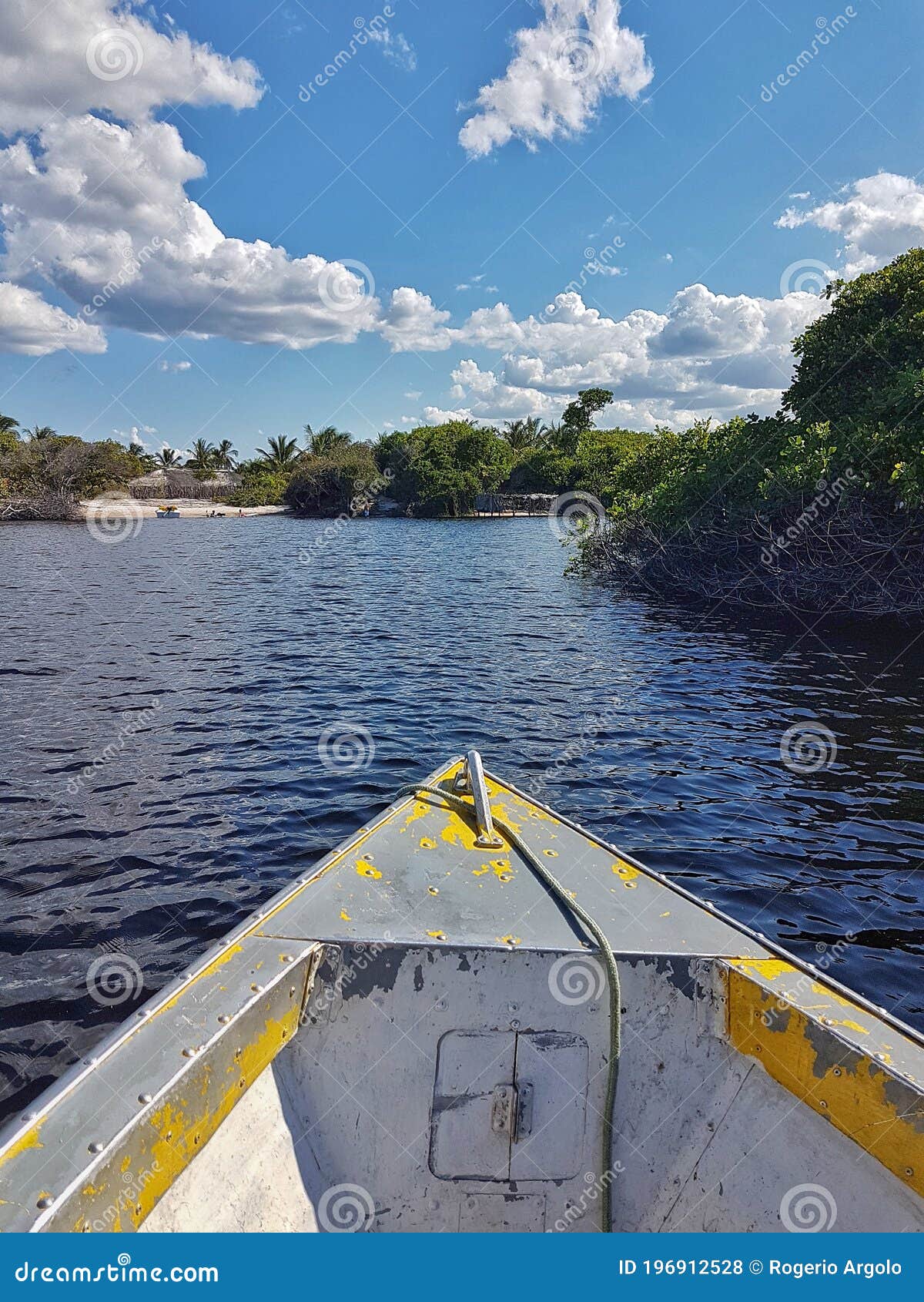Small Yellow Boat Sailing on the River. Stock Photo - Image of rowing ...