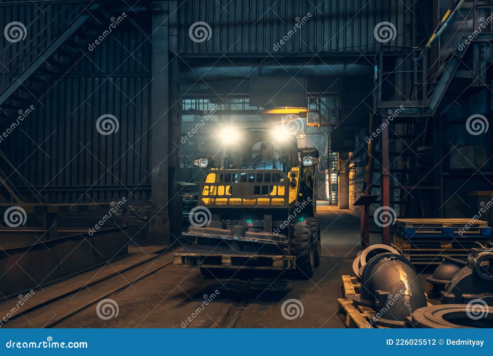 Small Yellow Loading Tractor or Mower at Work in Metallurgical Factory ...