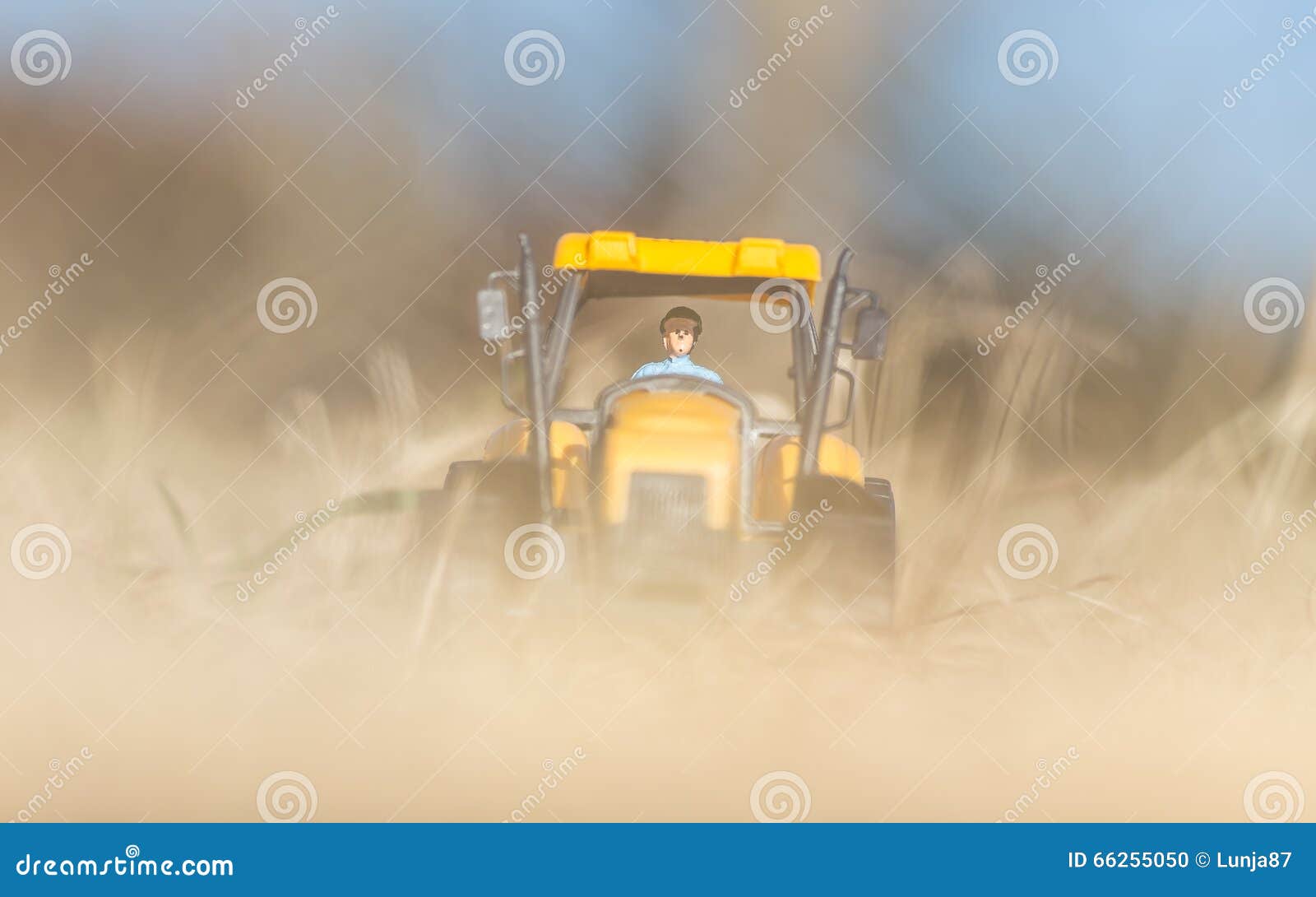 Small yellow toy tractor stock photo. Image of exhibition - 66255050