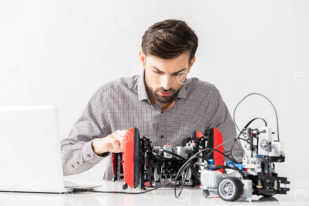 Smart Bearded Engineer Working with Gadget Stock Image - Image of ...