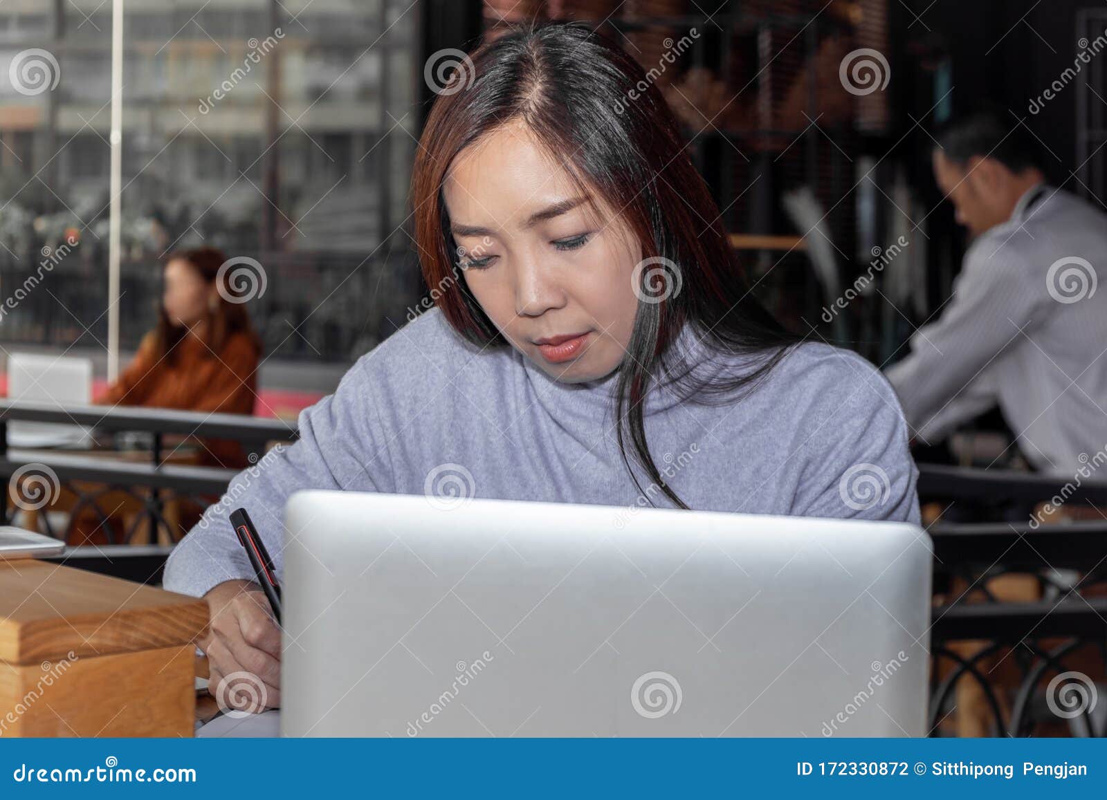 Smart Beautiful Clever Asian Female Write and Note Down Information of ...