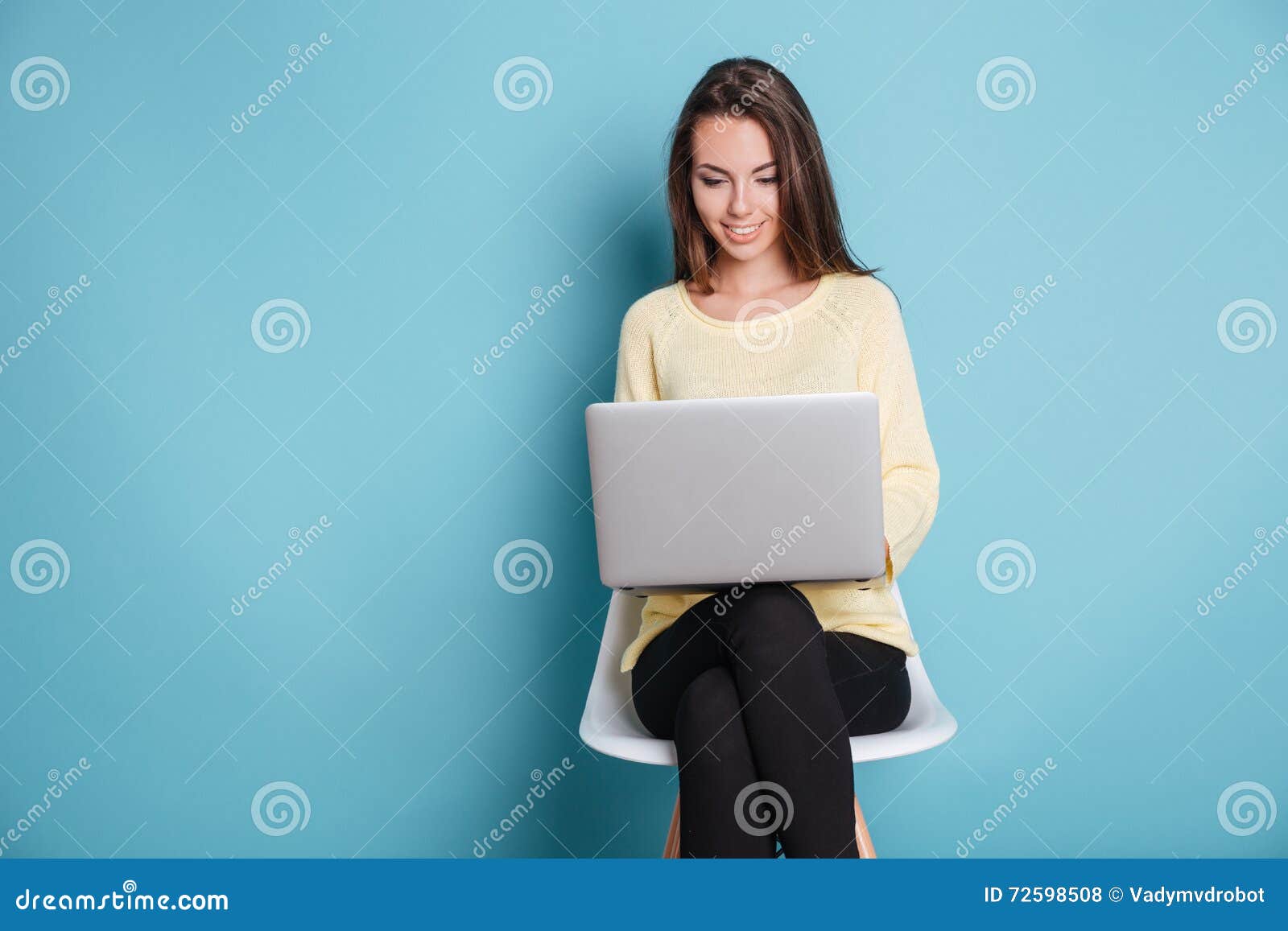 Smart Beautiful Young Girl Using Laptop Over Blue Background Stock ...