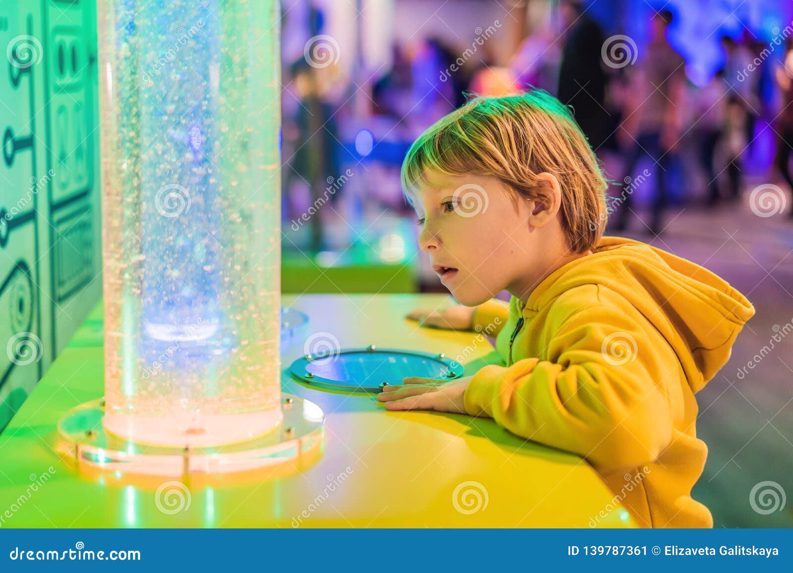 Smart Boy Scientist Making Physical Experiments in the Laboratory ...