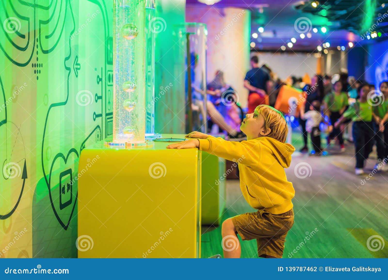 Smart Boy Scientist Making Physical Experiments in the Laboratory ...