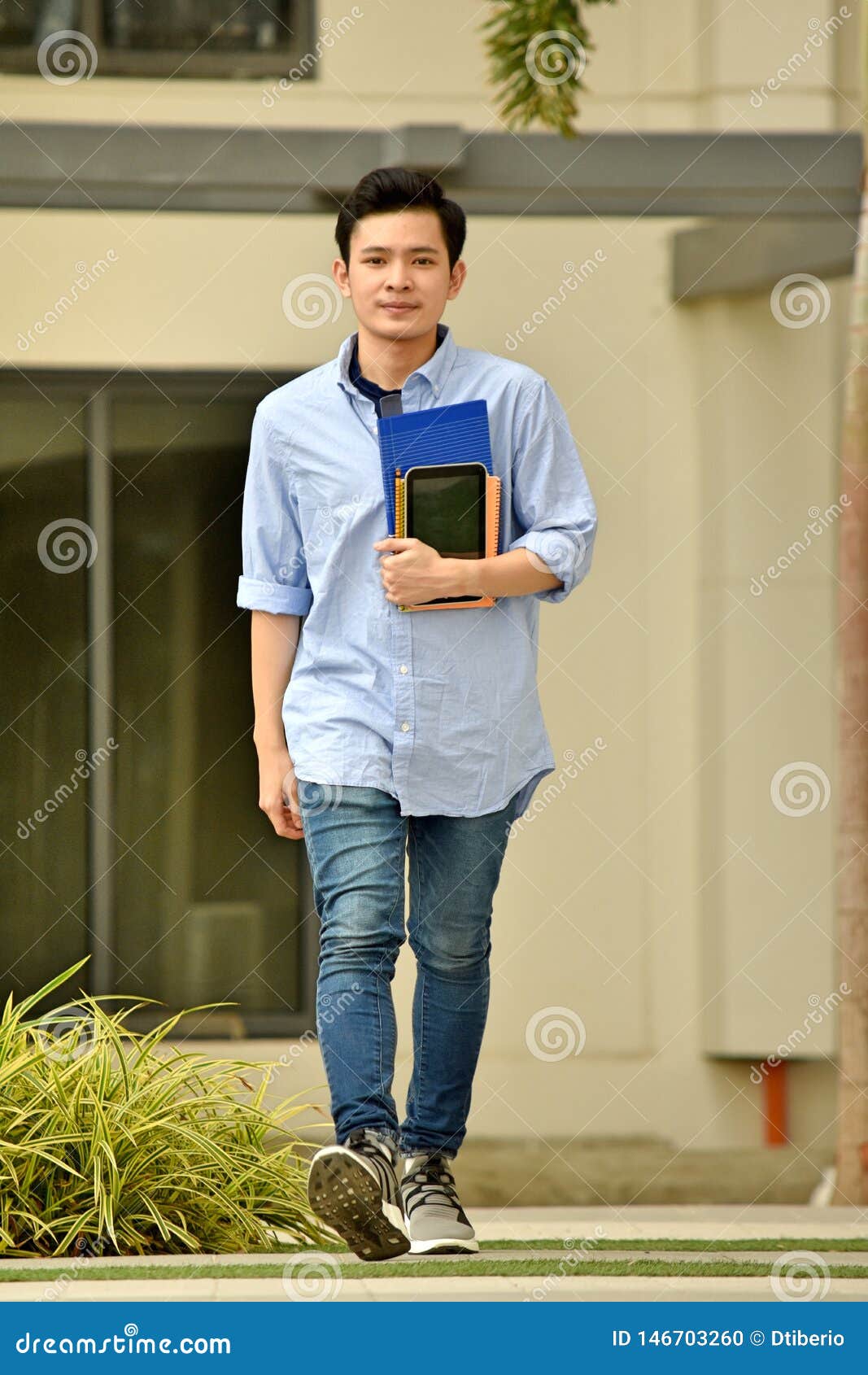Smart Boy Student Walking stock photo. Image of walking - 146703260