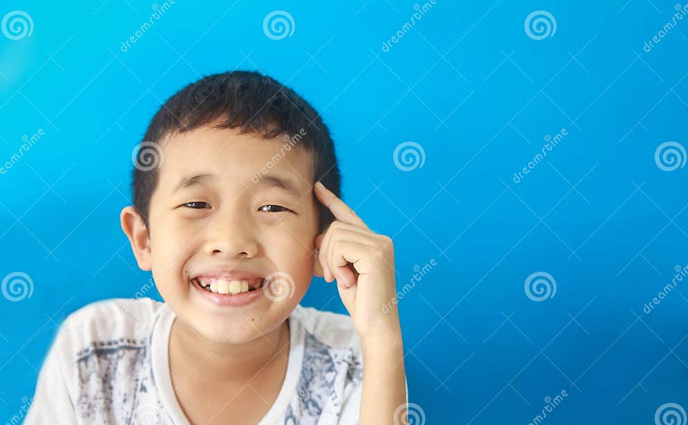 Smart Boy Think and Get Idea Then Smile Stock Photo - Image of people ...
