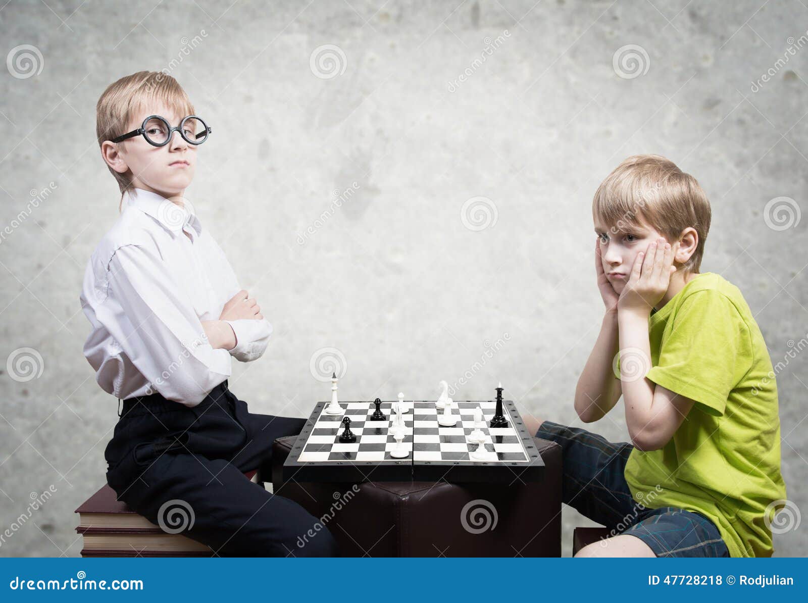 Smart boy vs stupid boy stock photo. Image of chess, funny - 47728218