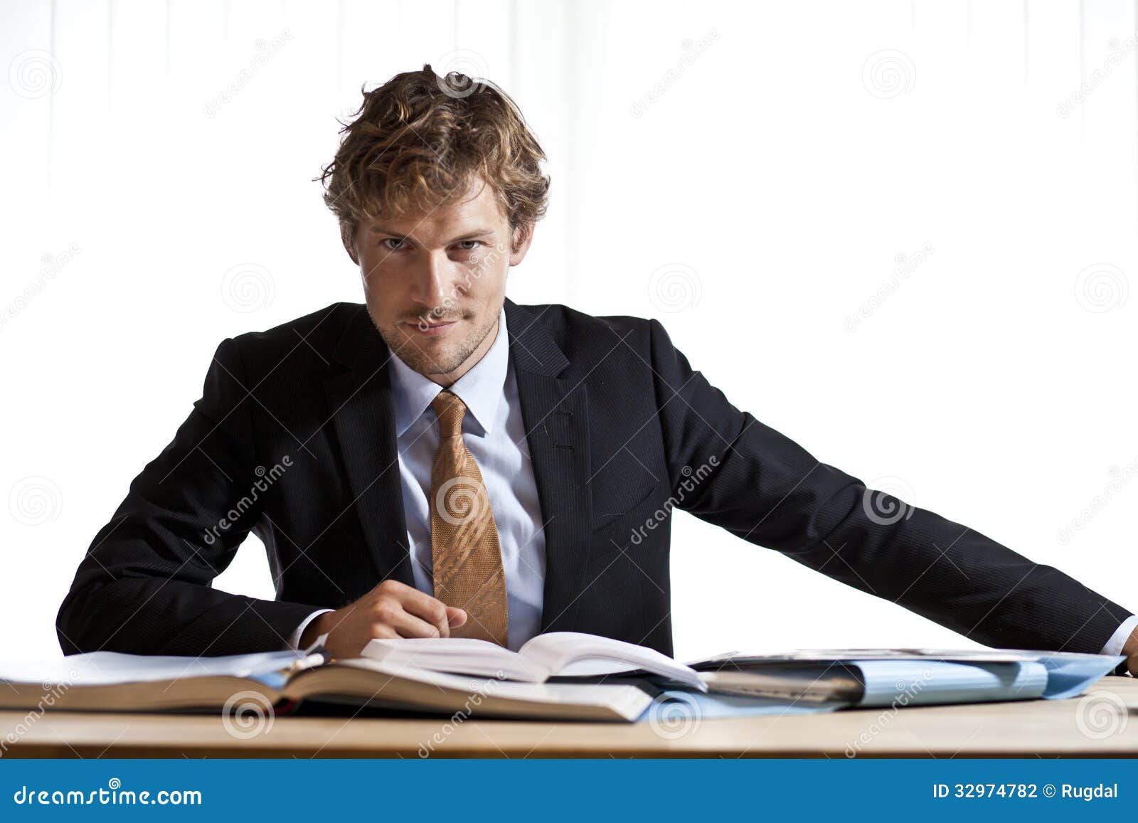 Smart Businessman Sitting at Desk Stock Photo - Image of business ...