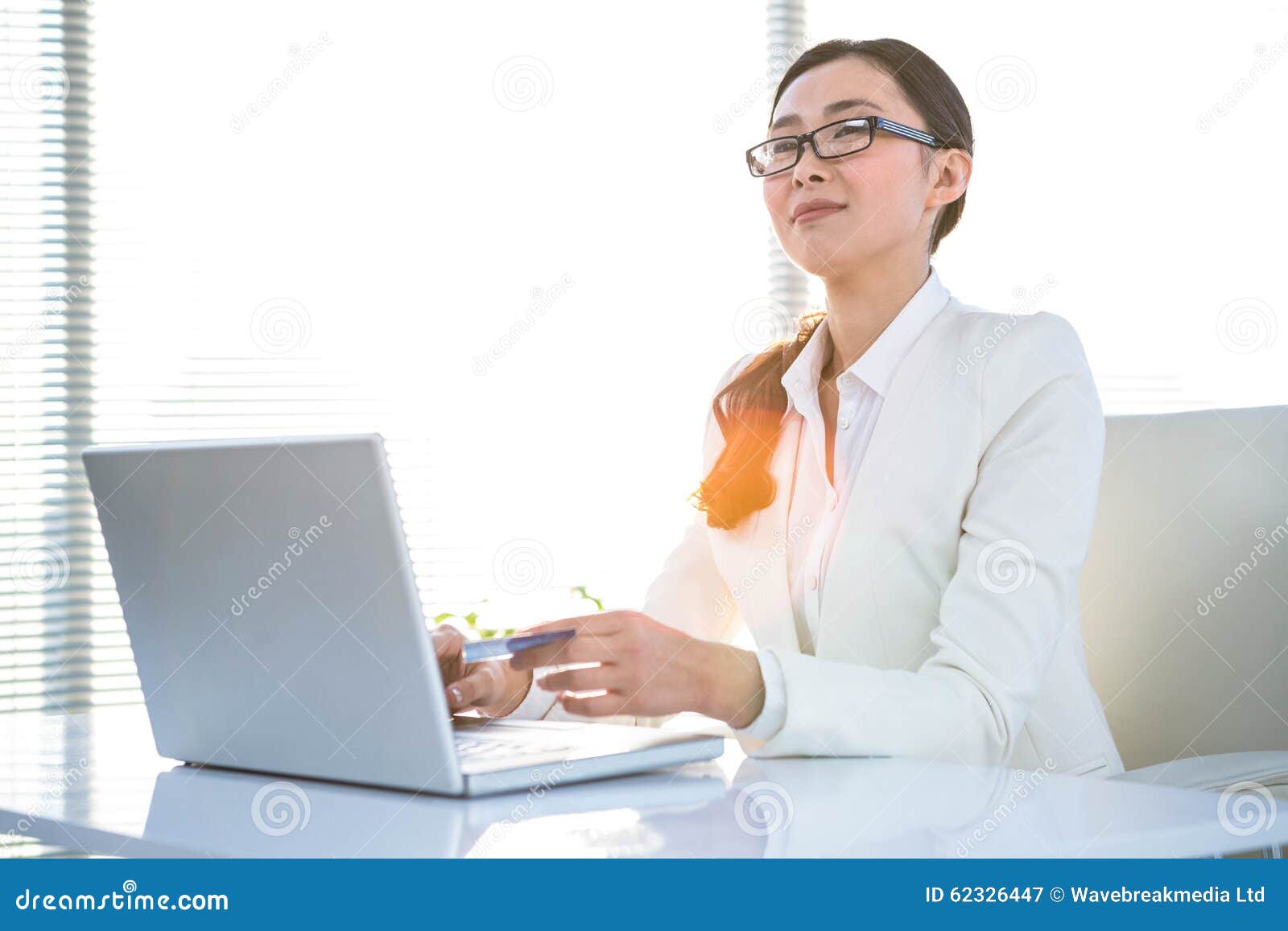 Smart Businesswoman Using Her Laptop Stock Image - Image of front ...