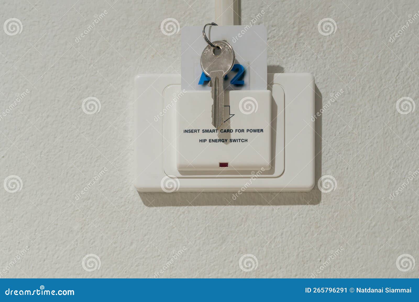 Smart Card with Key Inserted into White Socket with Text Reading Insert ...