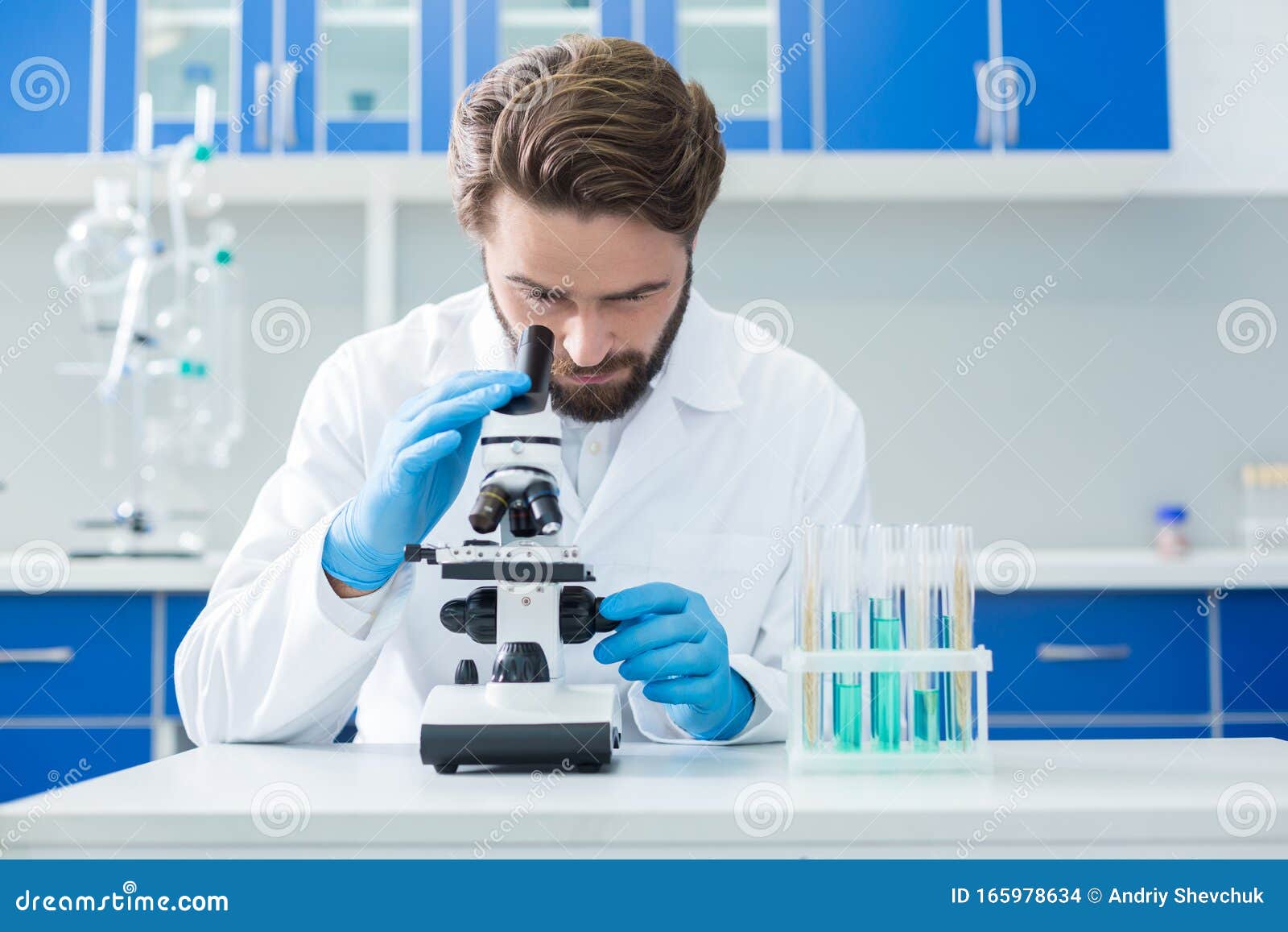 Smart Confident Scientist Looking into the Microscope Stock Photo ...