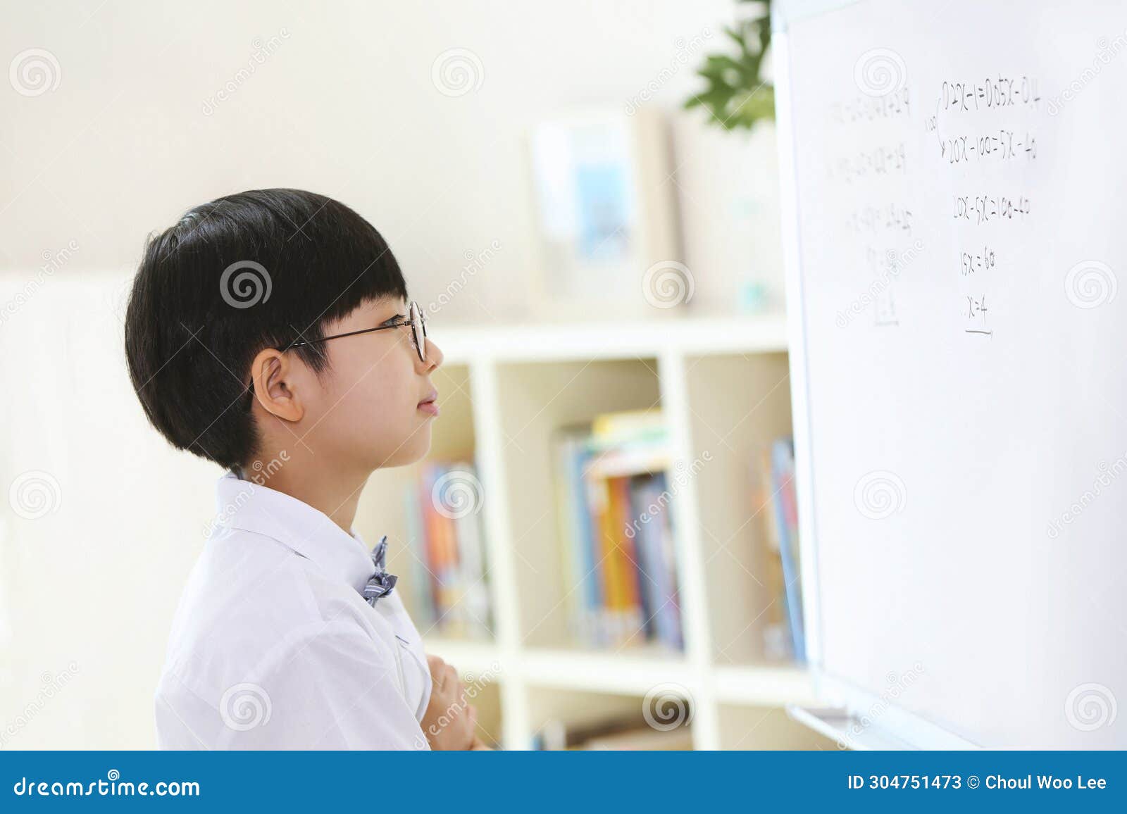 Student Pondering in Front of the Blackboard while Solving Mathematical ...
