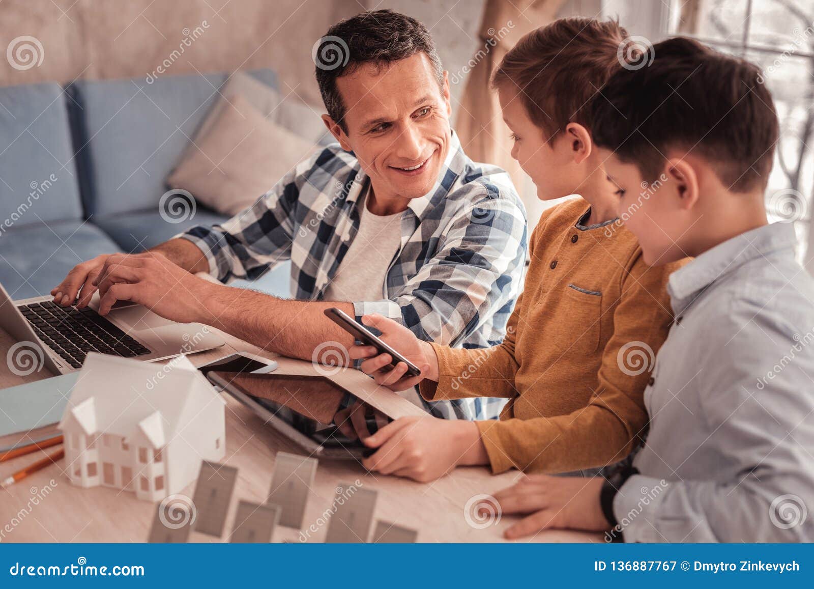 Smart Devoted Father Telling His Sons about Renewable Energy Stock ...