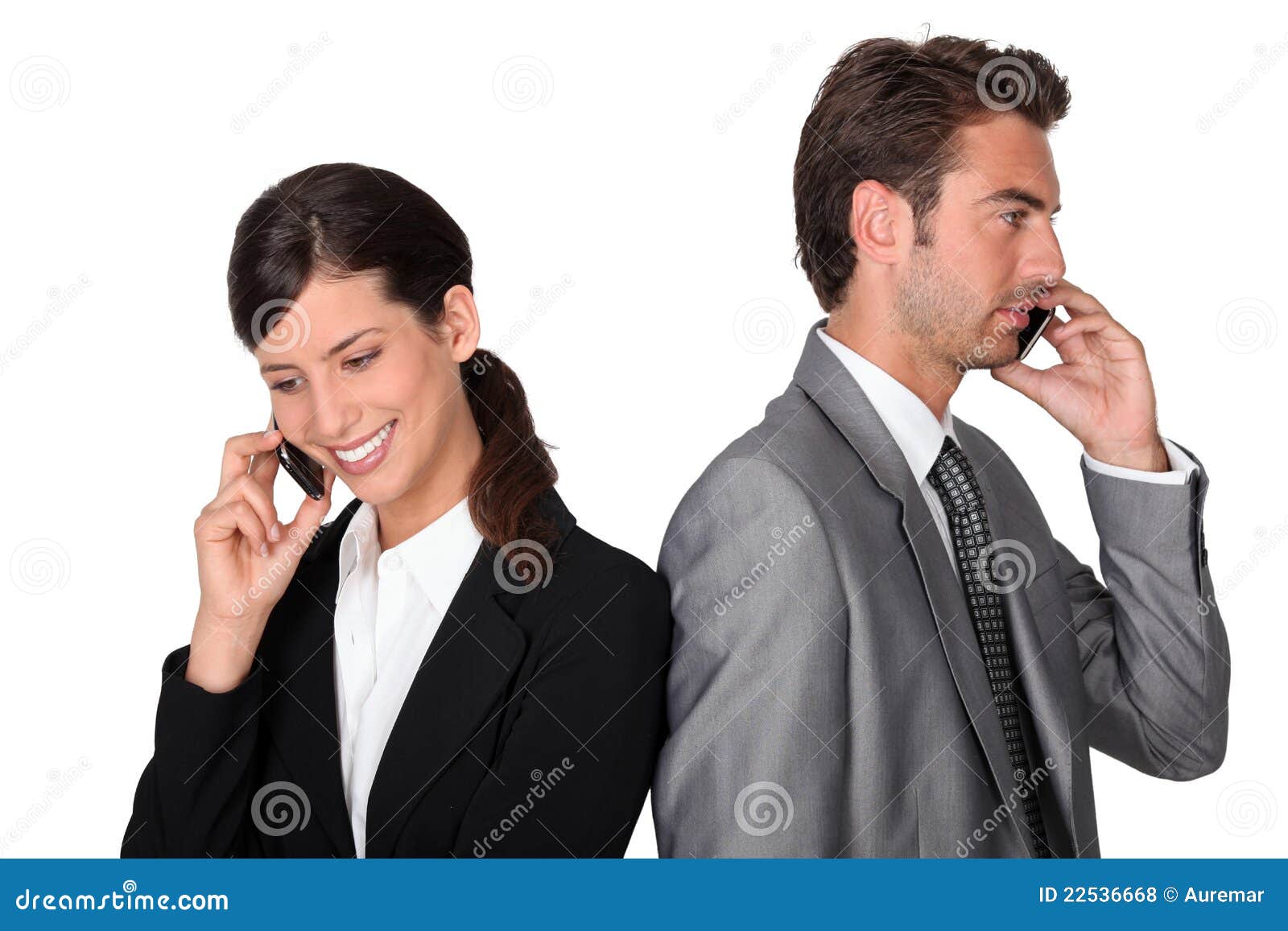 Smart duo on cell phone stock photo. Image of note, coat - 22536668