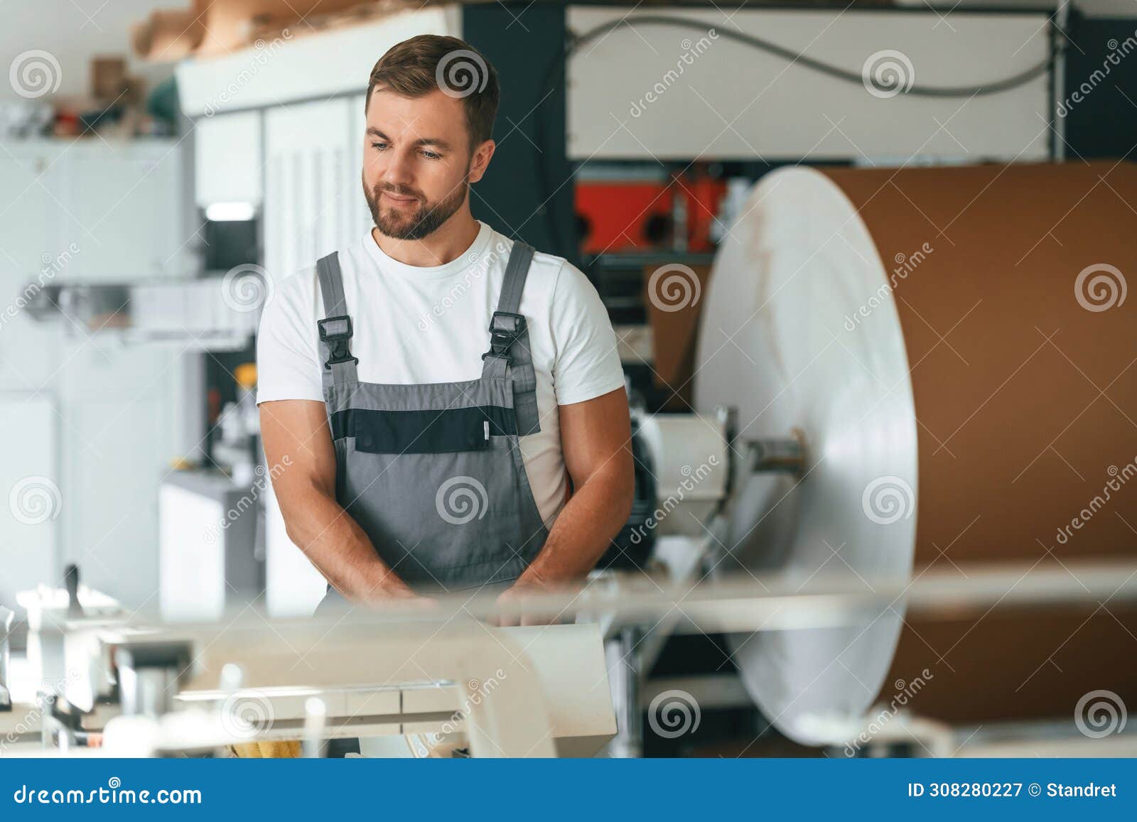 Smart Engineer. Handsome Man is Working at the Factory of Creating Eco ...