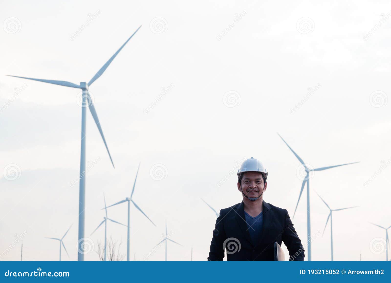 Smart Engineer Man Standing and Holding Computer Labtop with Wind ...