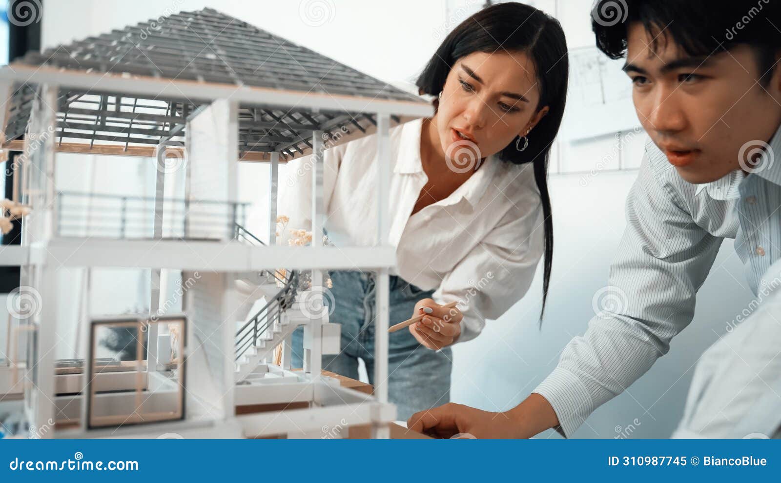 Smart Engineer Team Focusing on Checking the House Model Structure ...