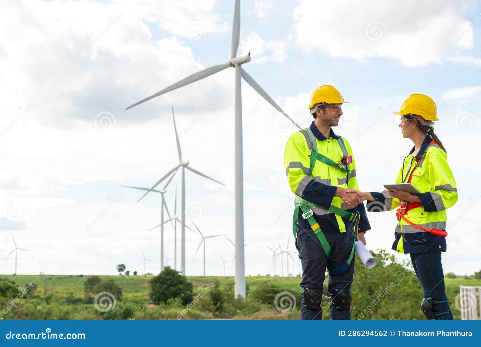 Smart Engineers with Protective Helmet Shaking Hands at Electrical ...