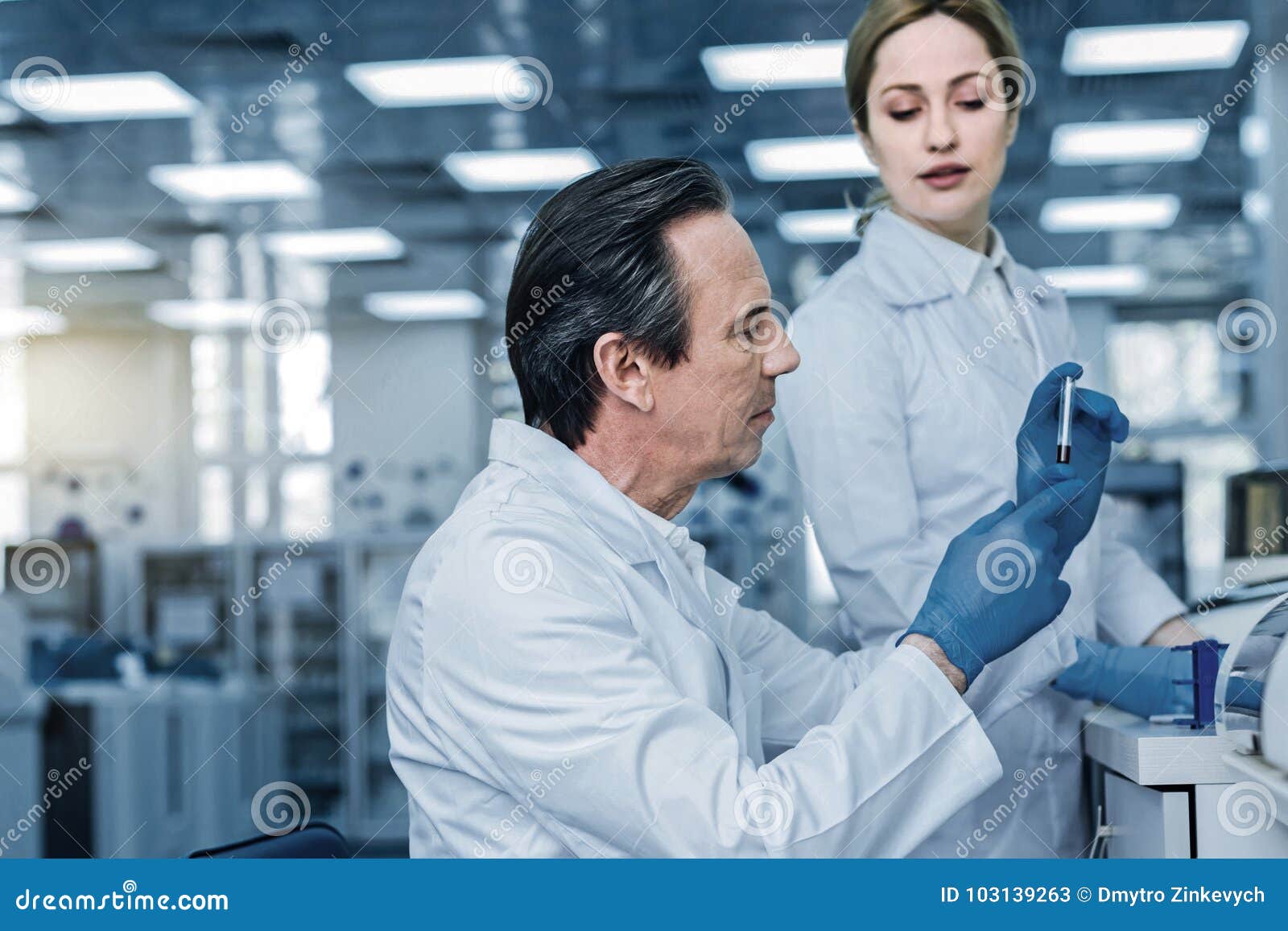 Smart Experienced Scientist Sitting at the Table Stock Image - Image of ...