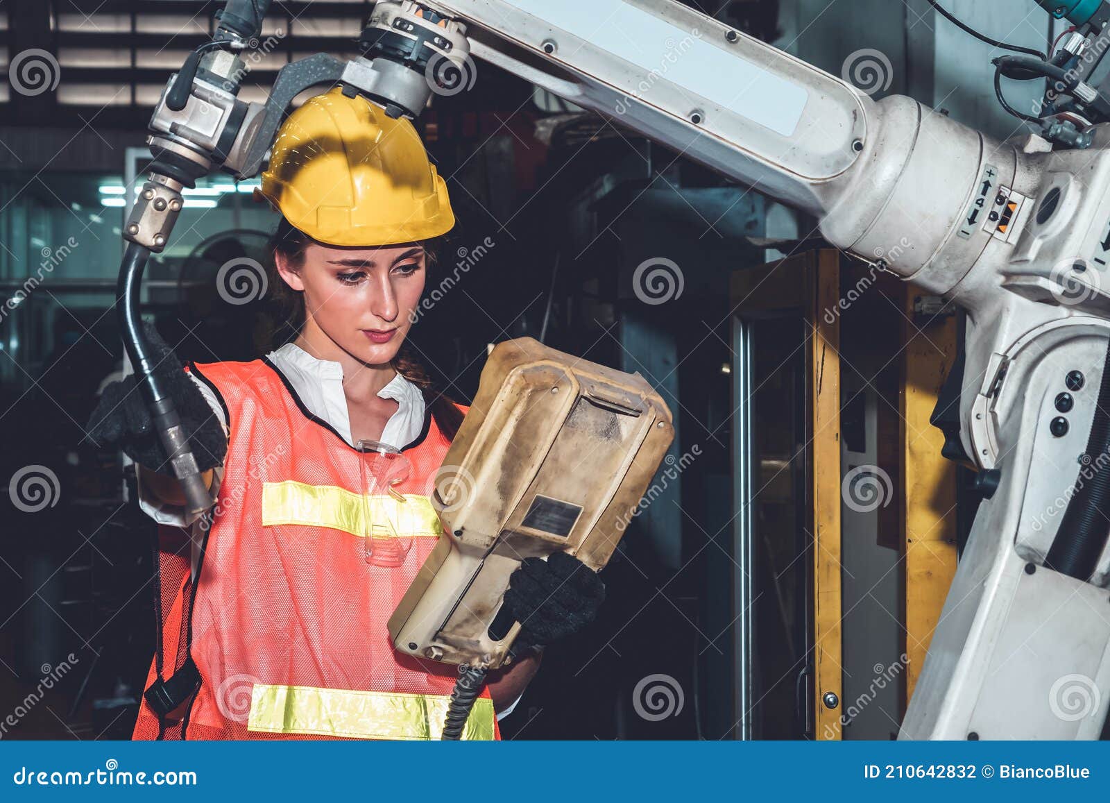 Smart Factory Job Worker Control Robotic Arm in Manufacturing Workshop ...