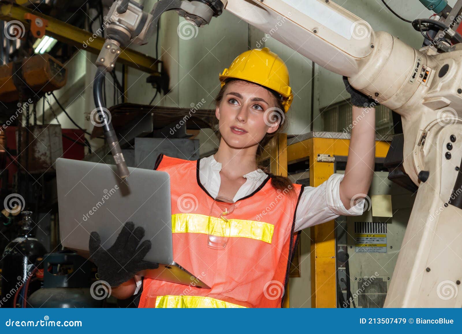 Smart Factory Job Worker Control Robotic Arm in Manufacturing Workshop ...