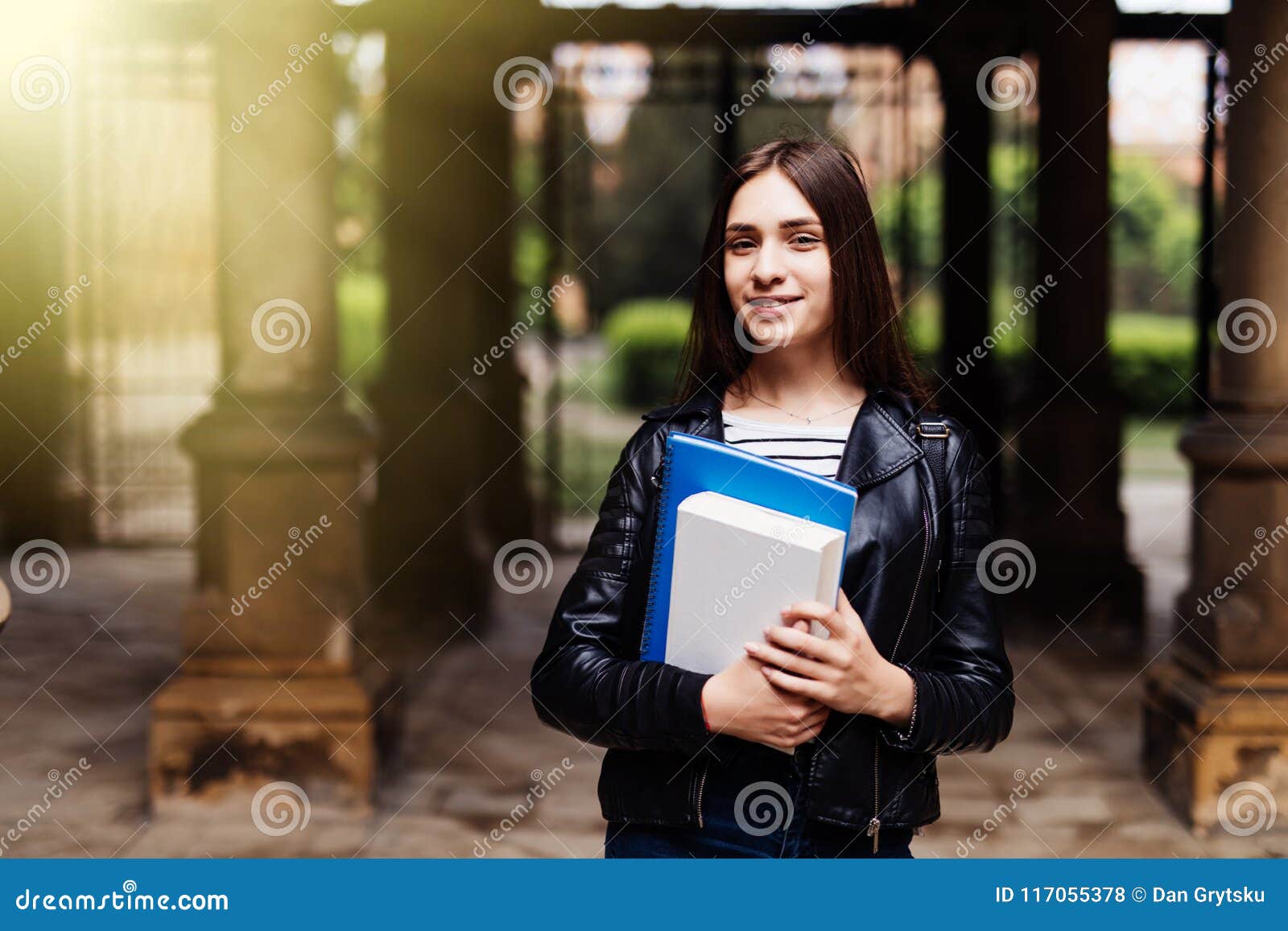 Young Smart Female College Student on Campus Outdoors Stock Photo ...