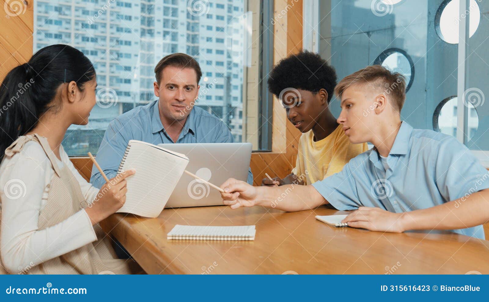 Girl Ask Teacher a Question while Show Idea while Student Working ...