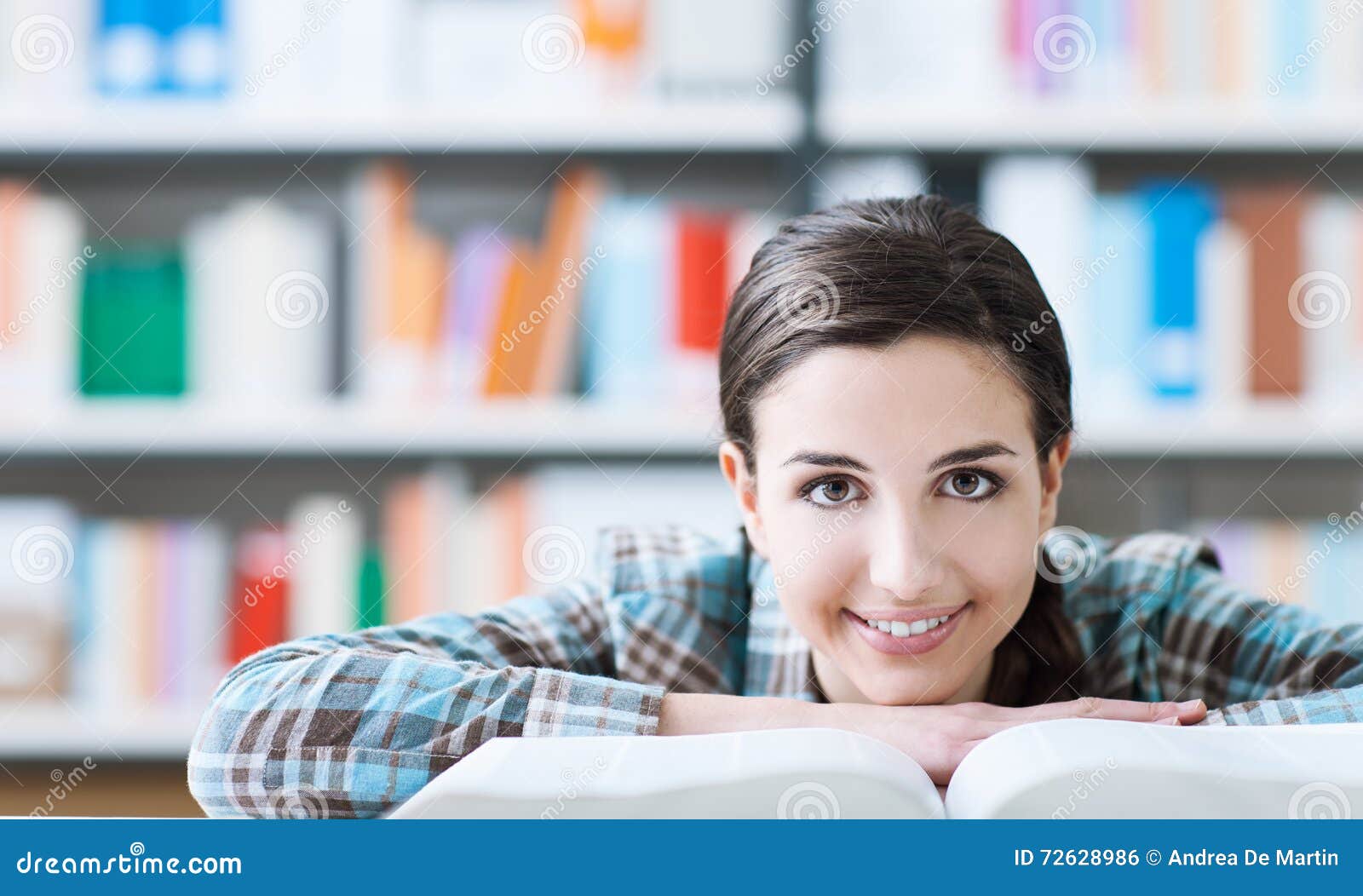 Smart girl reading a book stock photo. Image of student - 72628986