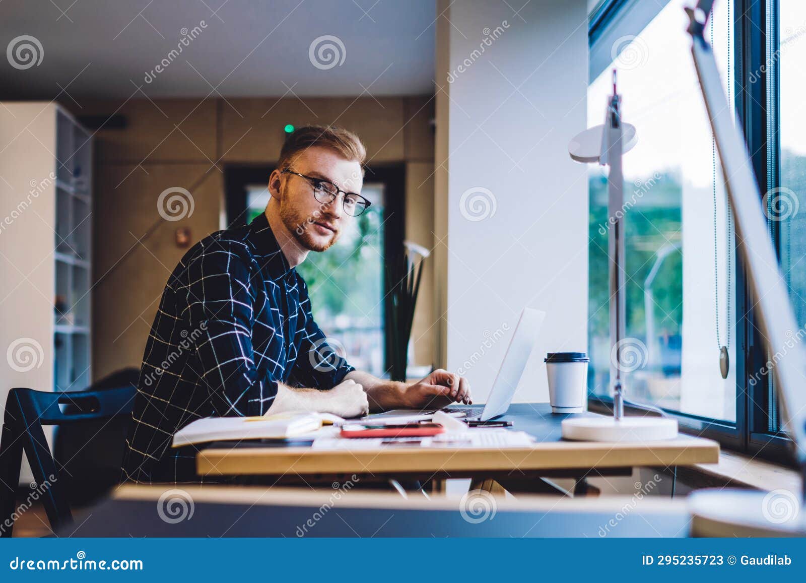 Smart Guy Using Laptop in Workspace Stock Image - Image of distance ...