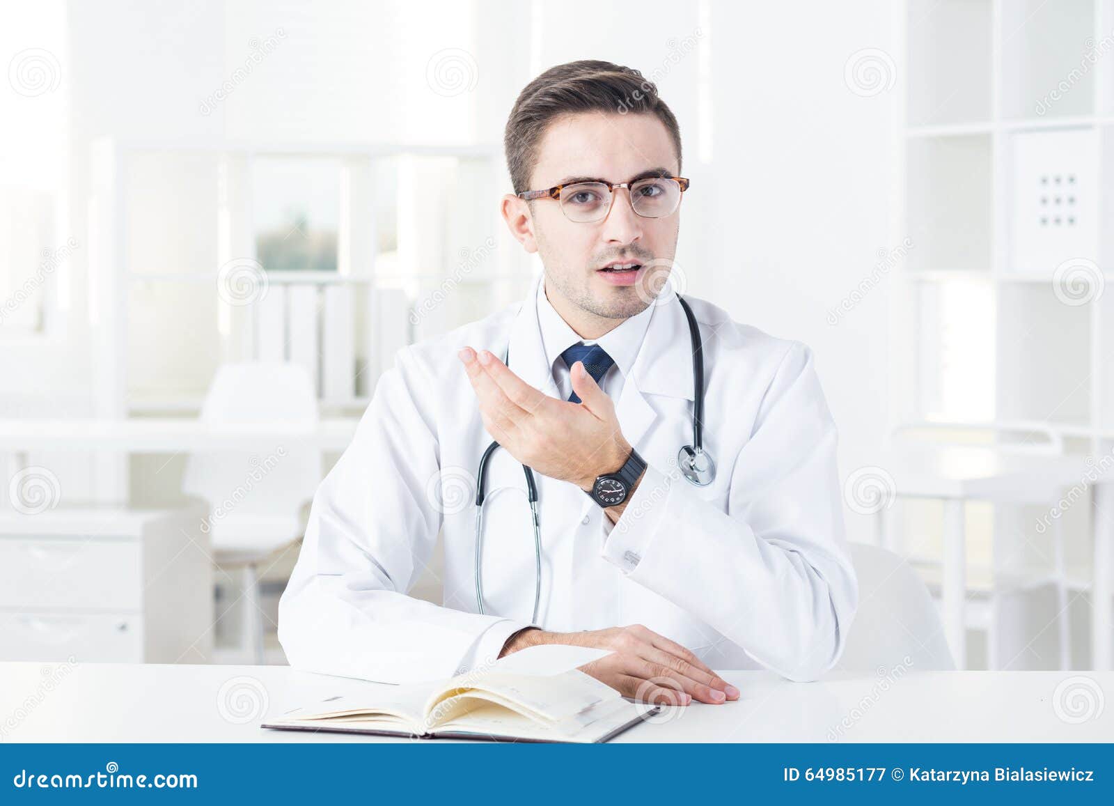 Smart handsome doctor stock image. Image of horizontal - 64985177