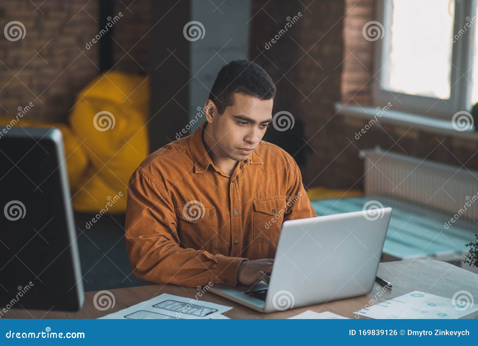 Smart Handsome Man Typing on His Laptop Stock Photo - Image of indoors ...