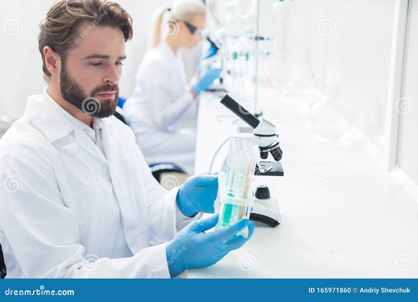 Smart Hard Working Scientist Holding a Rack with Test Tubes Stock Photo ...